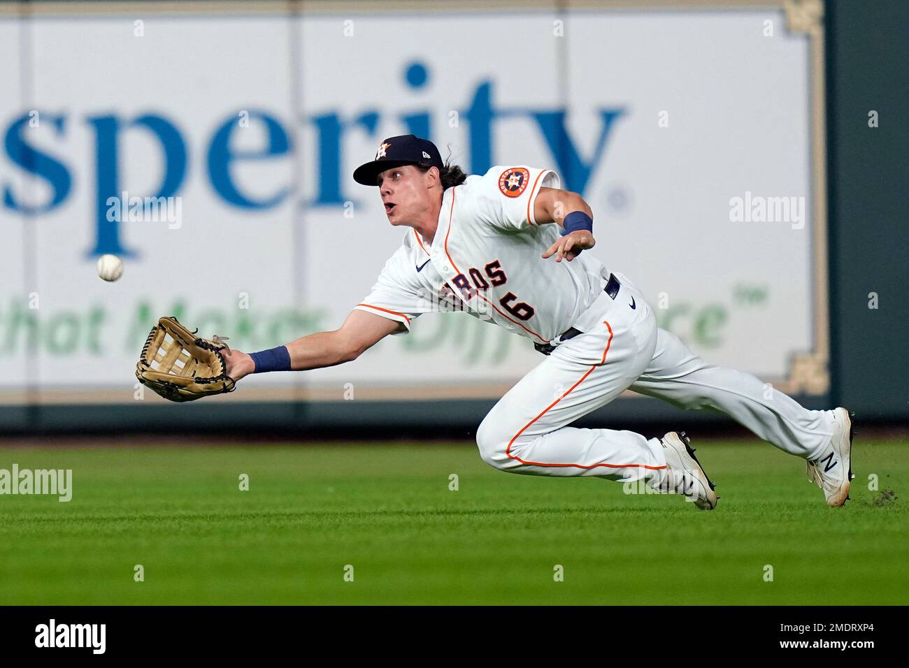 Houston Astros center fielder Jake Meyers tries to catch a single by ...