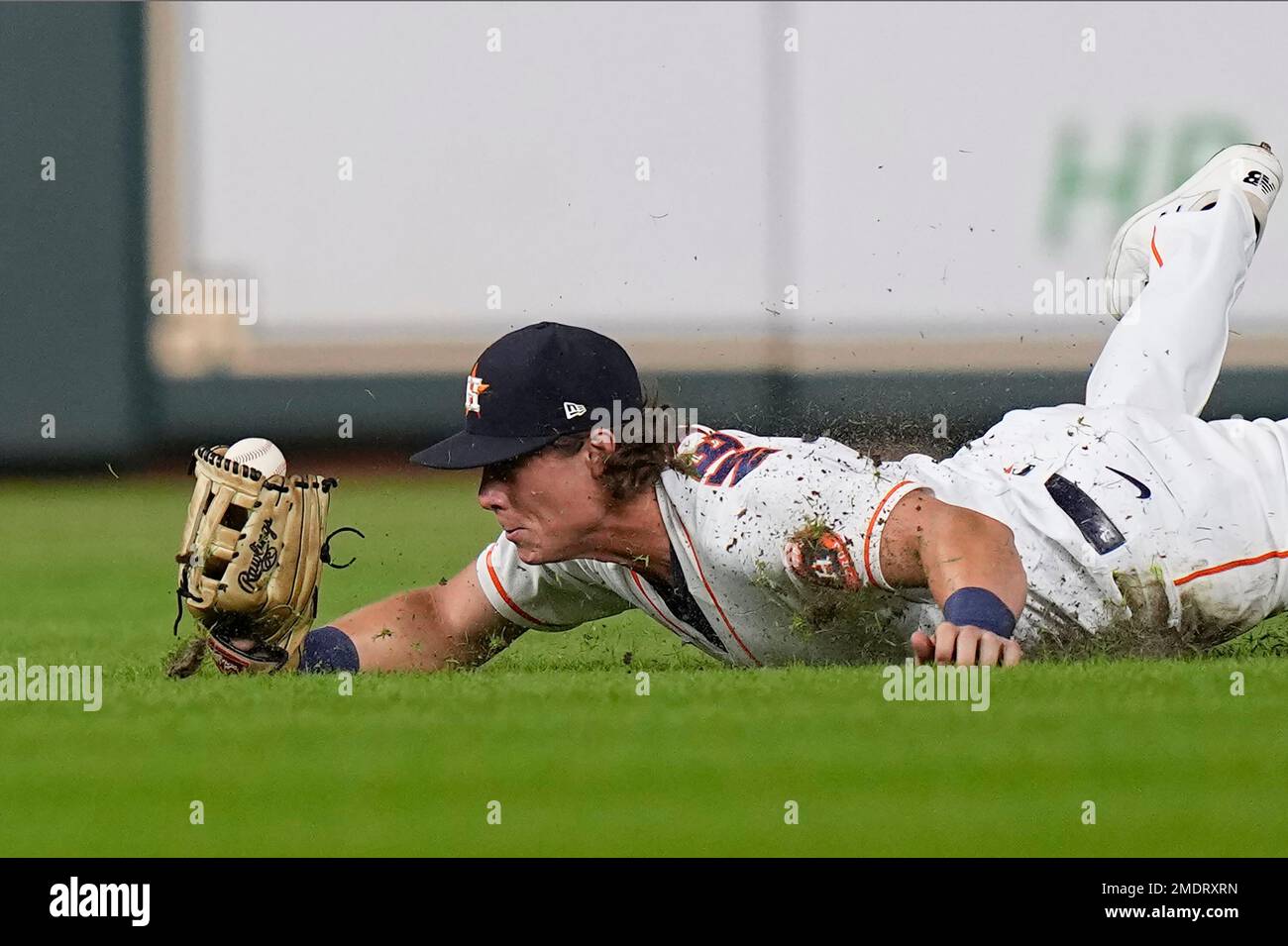 Houston Astros center fielder Jake Meyers tries to catch a single by ...