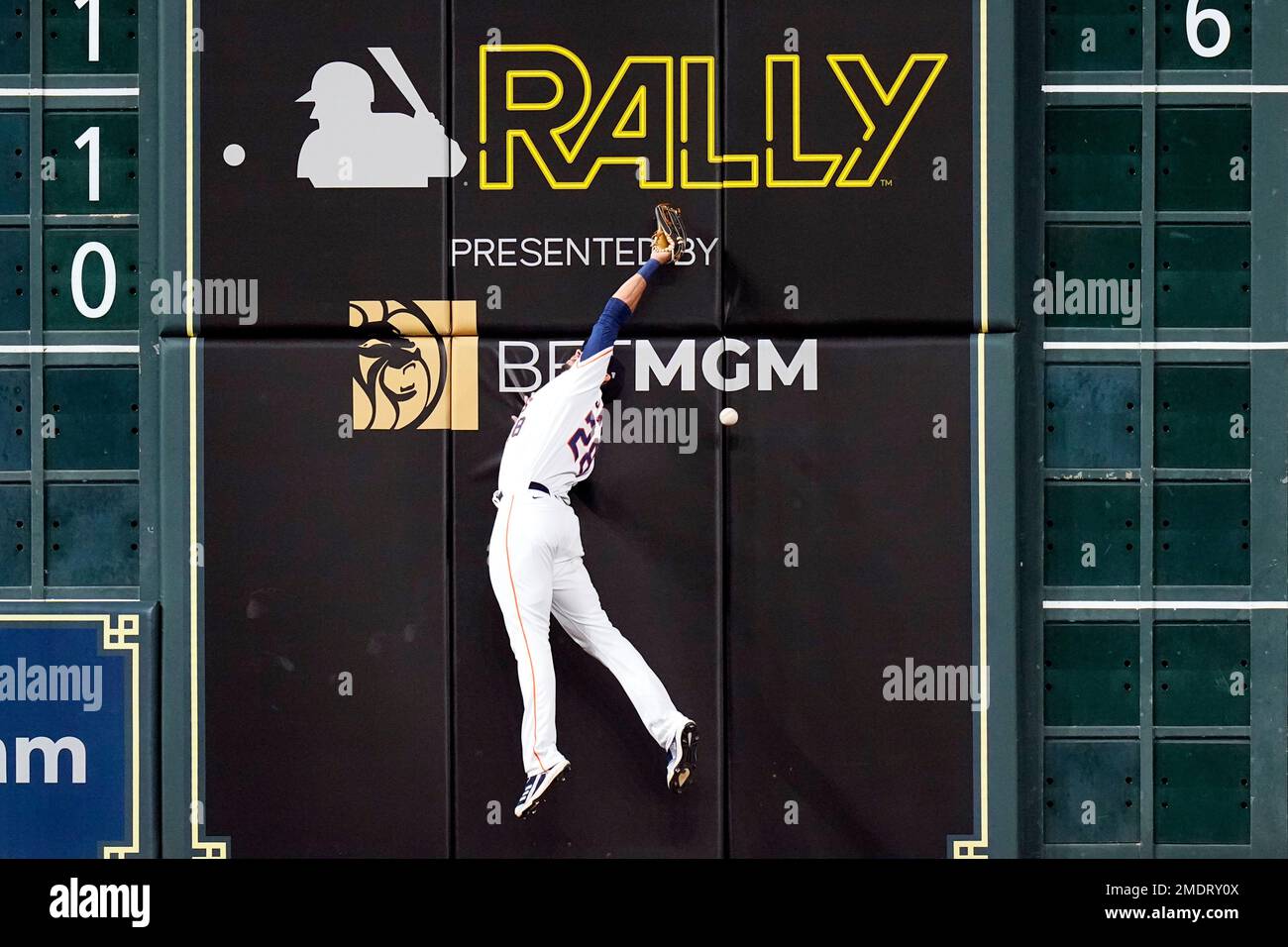 Houston Astros left fielder Taylor Jones tries to catch a double by ...