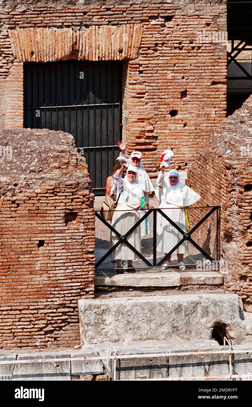 Nuns waving inside the Colosseum, Rome, Italy Stock Photo - Alamy