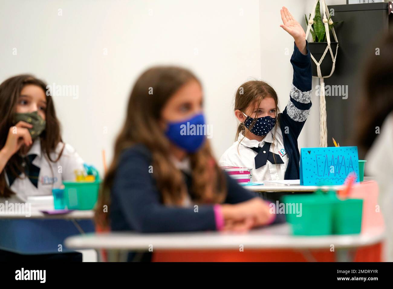 Emma Orell raises her hand in fourth grade class at iPrep Academy on ...