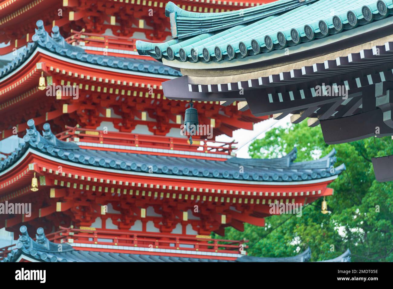 Traditional curved wooden roofs in Japan. Selective focus Stock Photo ...