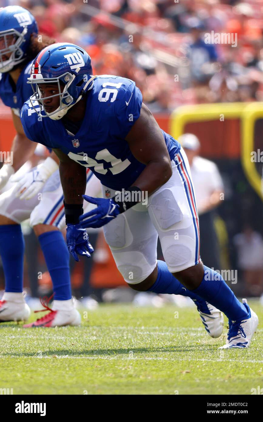 New York Giants defensive end Raymond Johnson III (91) runs off of the ...