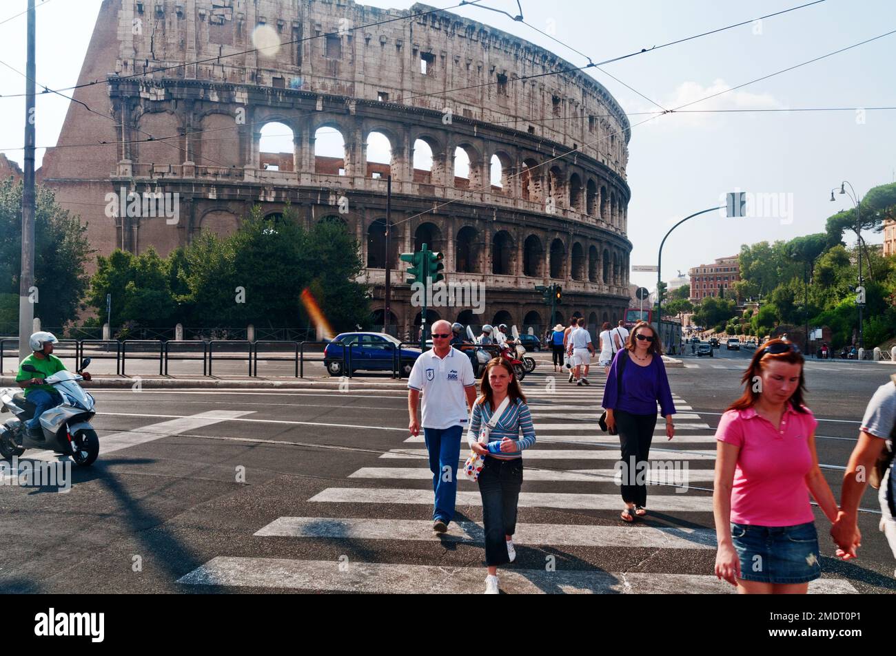 Tourists walking outside the Colosseum, Rome, Italy Stock Photo - Alamy