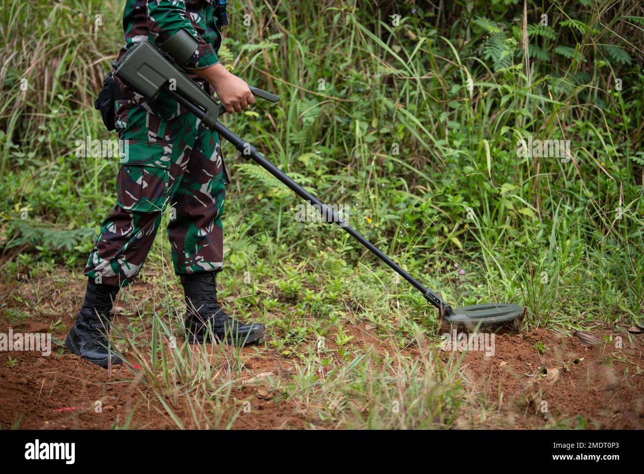 Indonesian Army soldiers conduct a culminating explosive ordnance ...