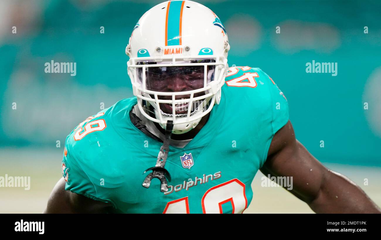 Miami Dolphins linebacker Sam Eguavoen (49) runs on the field during ...