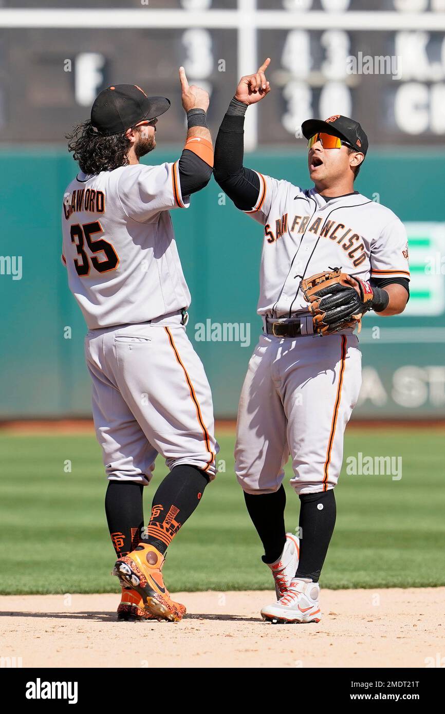 San Francisco Giants' Brandon Crawford, left, celebrates with Donovan ...