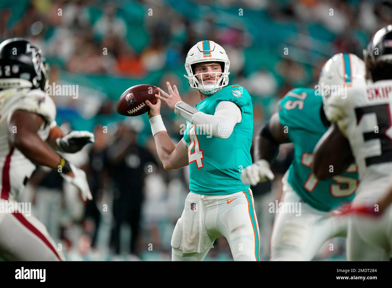 Miami Dolphins quarterback Reid Sinnett (4) aims the ball during the ...