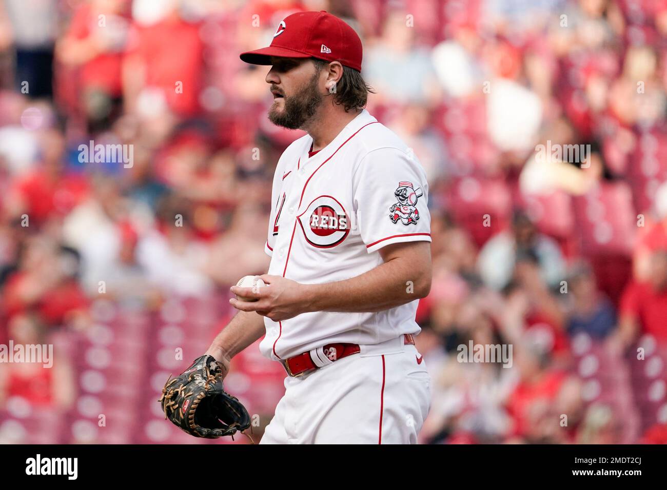 Cincinnati Reds starting pitcher Wade Miley (22) stands on the mound ...