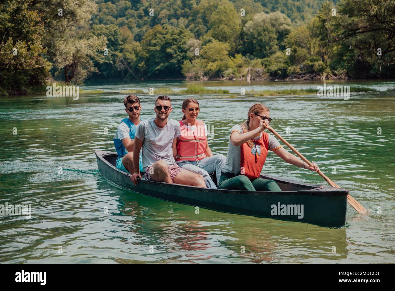 Group adventurous explorer friends are canoeing in a wild river Stock ...