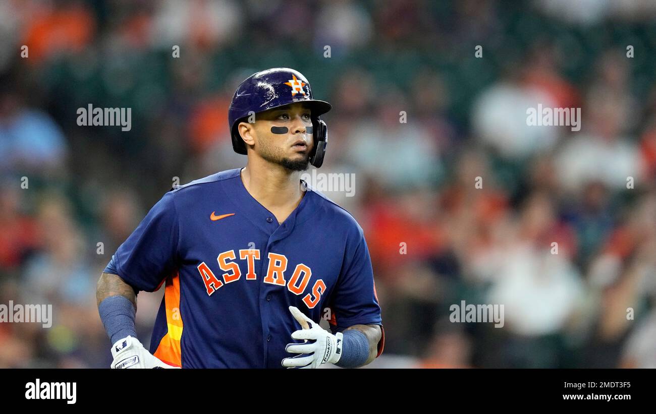 Houston Astros' Martin Maldonado runs down the first base line during ...