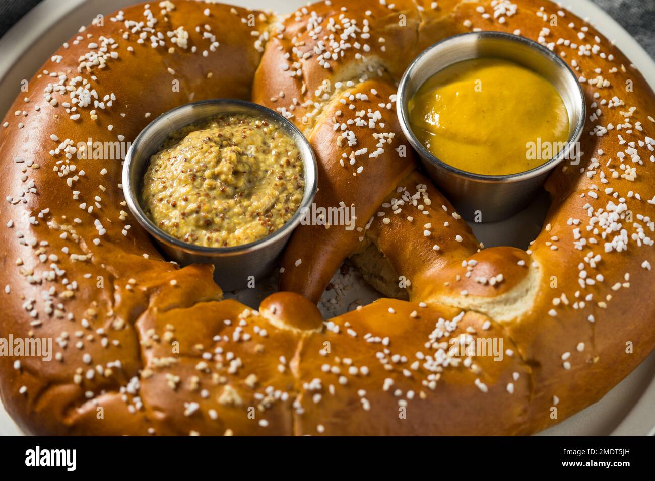 Homemade Huge Giant Soft German Pretzel with Mustard Stock Photo - Alamy