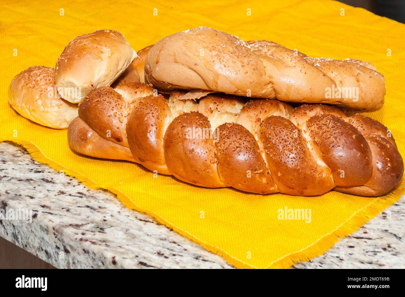 Tasty bread; different types of bread on the kitchen counter, on a ...