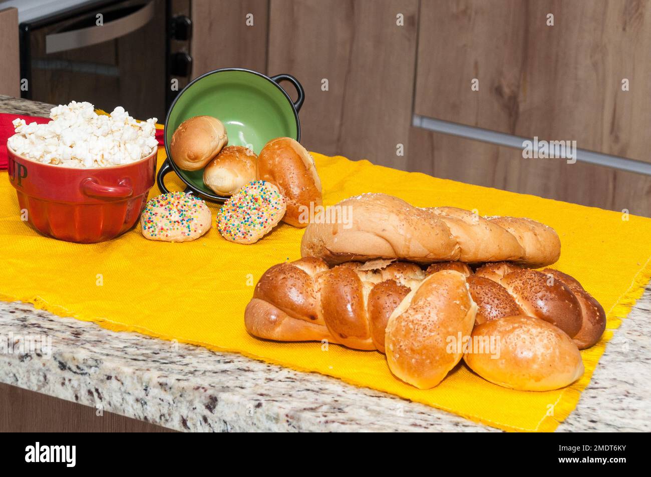 Tasty bread; different types of bread on the kitchen counter, on a ...