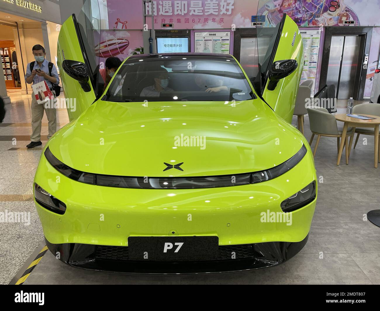 A Xpeng P7 car is displayed at a shopping mall in Beijing, China, on ...