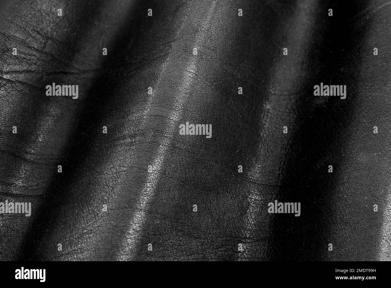 Black leather texture. Abstract background of dark leather with small ...