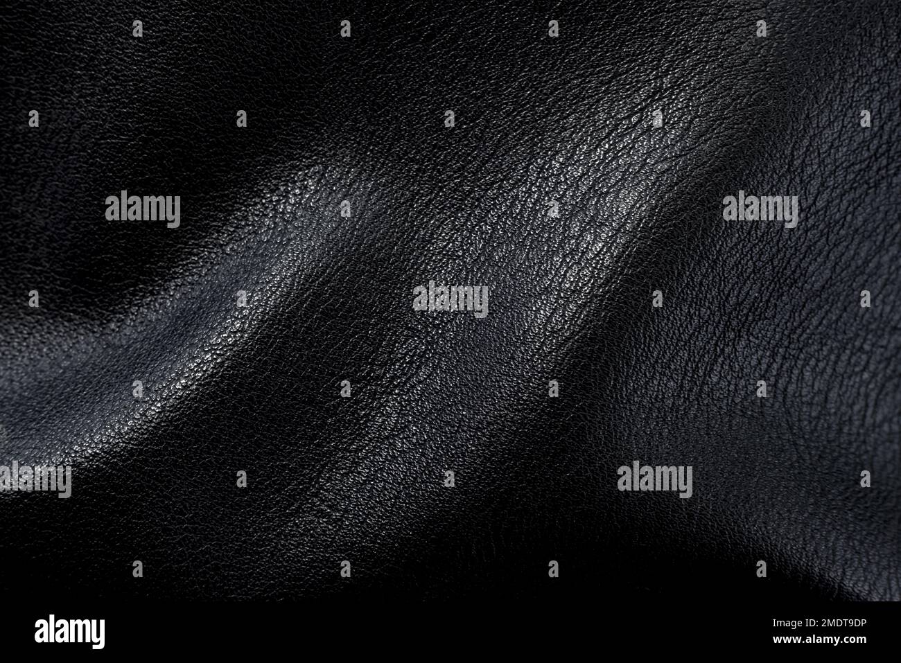 Black leather texture. Abstract background of dark leather with small ...