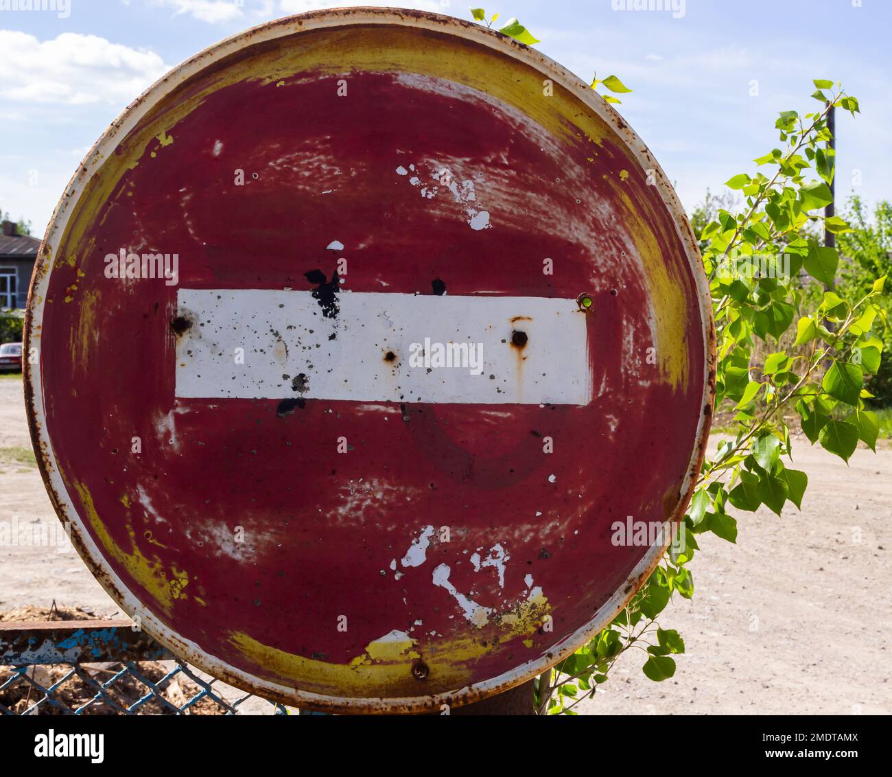Weathered, scratched and dirty old red and white round No entry road ...
