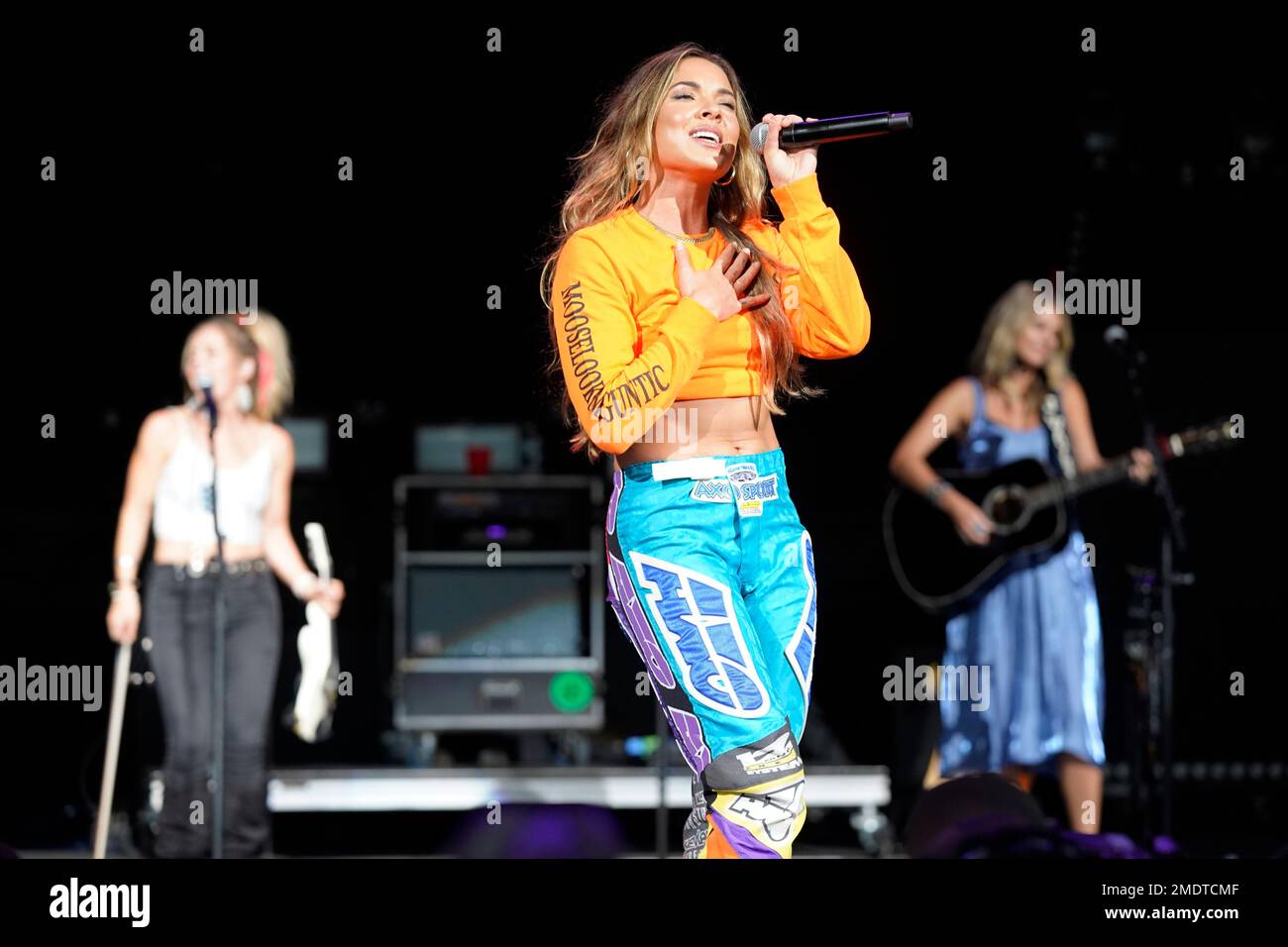 Naomi Cooke of Runaway June performs an opening act on the Proud To Be ...