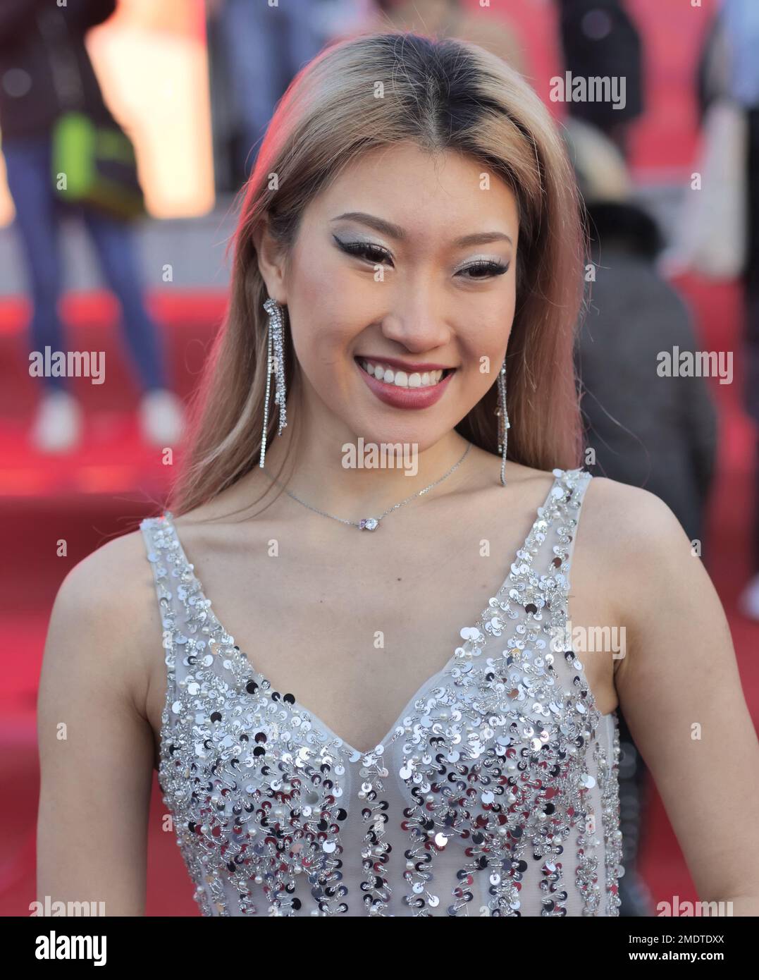 Asian singer posing for photographers after Lunar New Year Festival ...