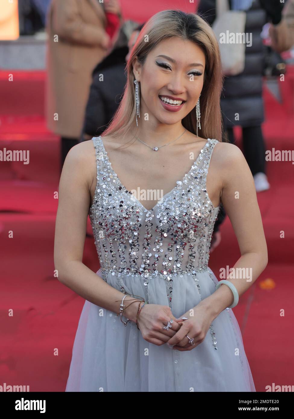 Asian singer posing for photographers after Lunar New Year Festival ...