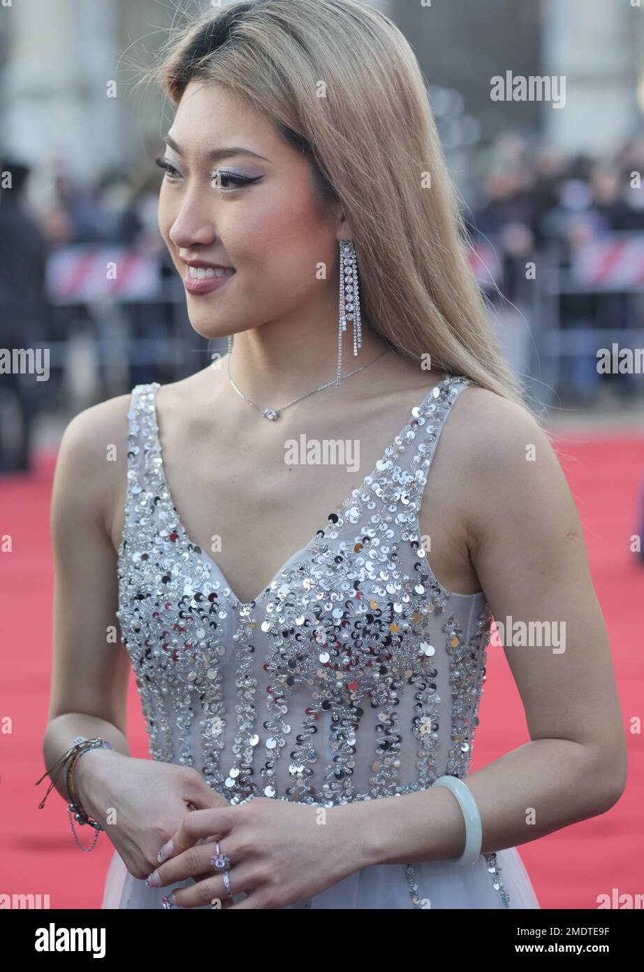 Asian singer posing for photographers after Lunar New Year Festival ...