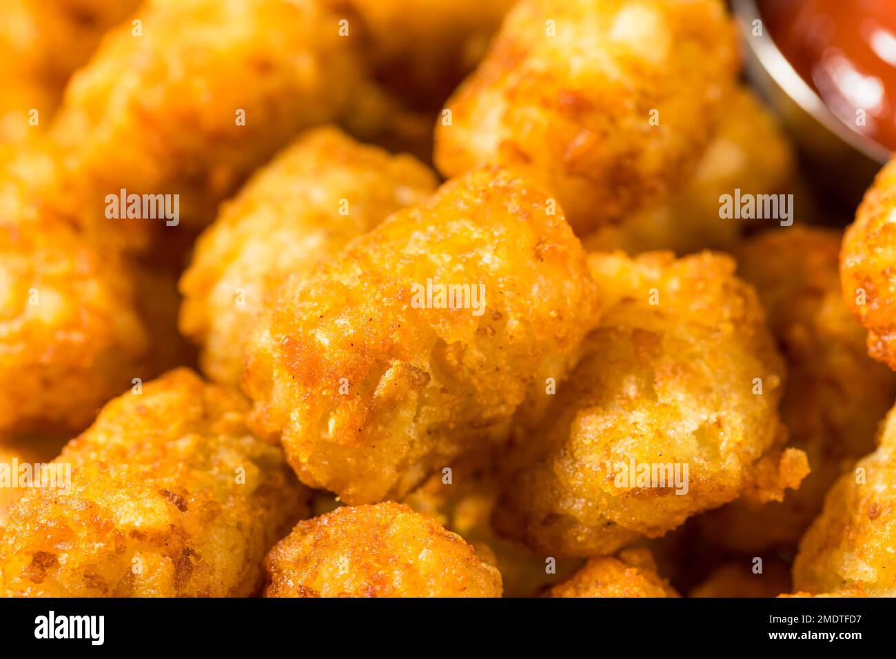 Homemade Baked Tater Tots Potatoes with Ketchup Stock Photo - Alamy