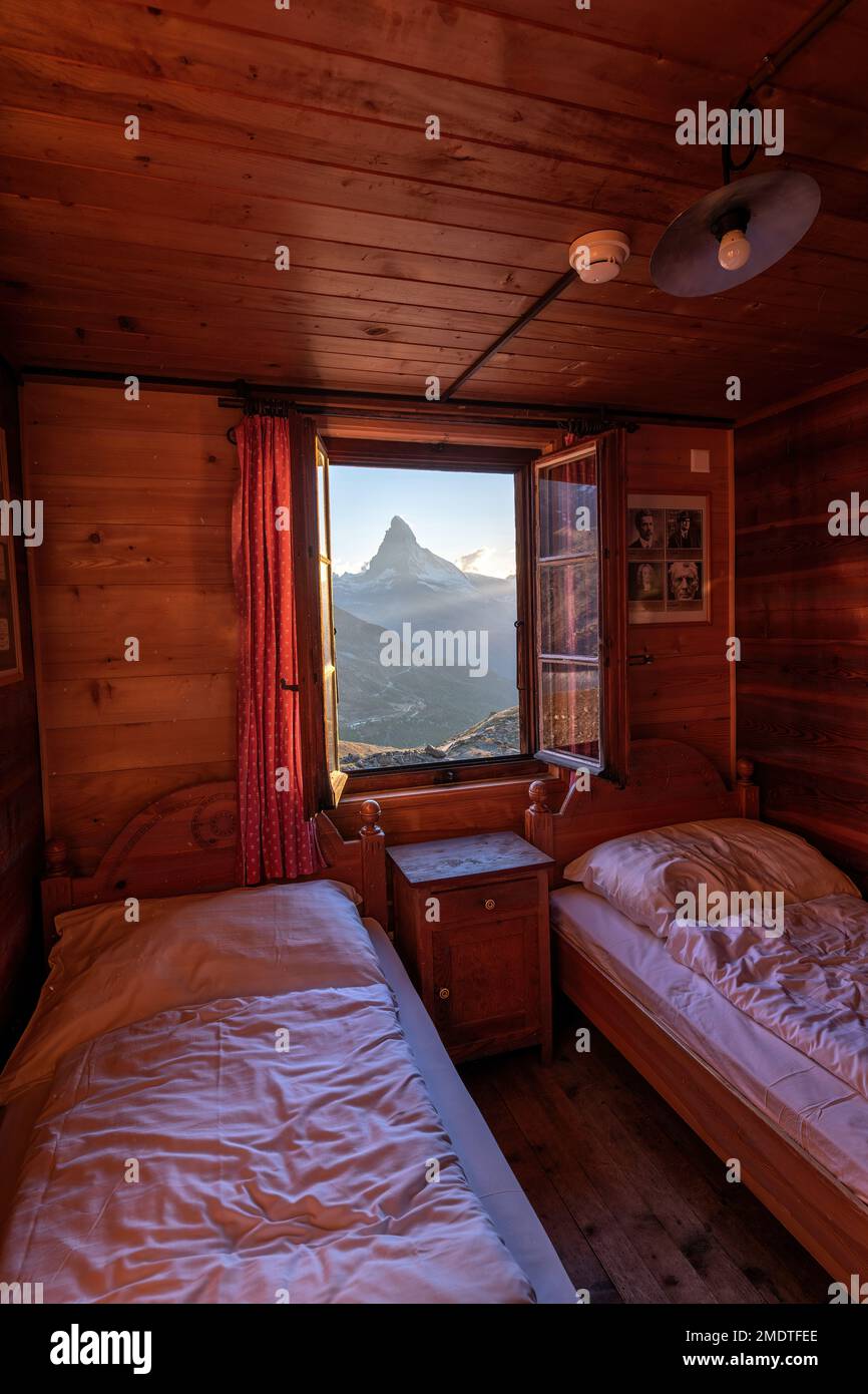 A mountain landscape photographed from a house, the window forms the ...