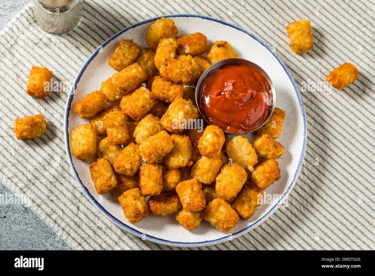 Homemade Baked Tater Tots Potatoes with Ketchup Stock Photo - Alamy