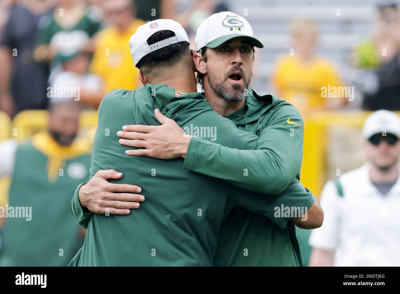 Green Bay Packers' Aaron Rodgers hugs Jordan Love before a preseason ...
