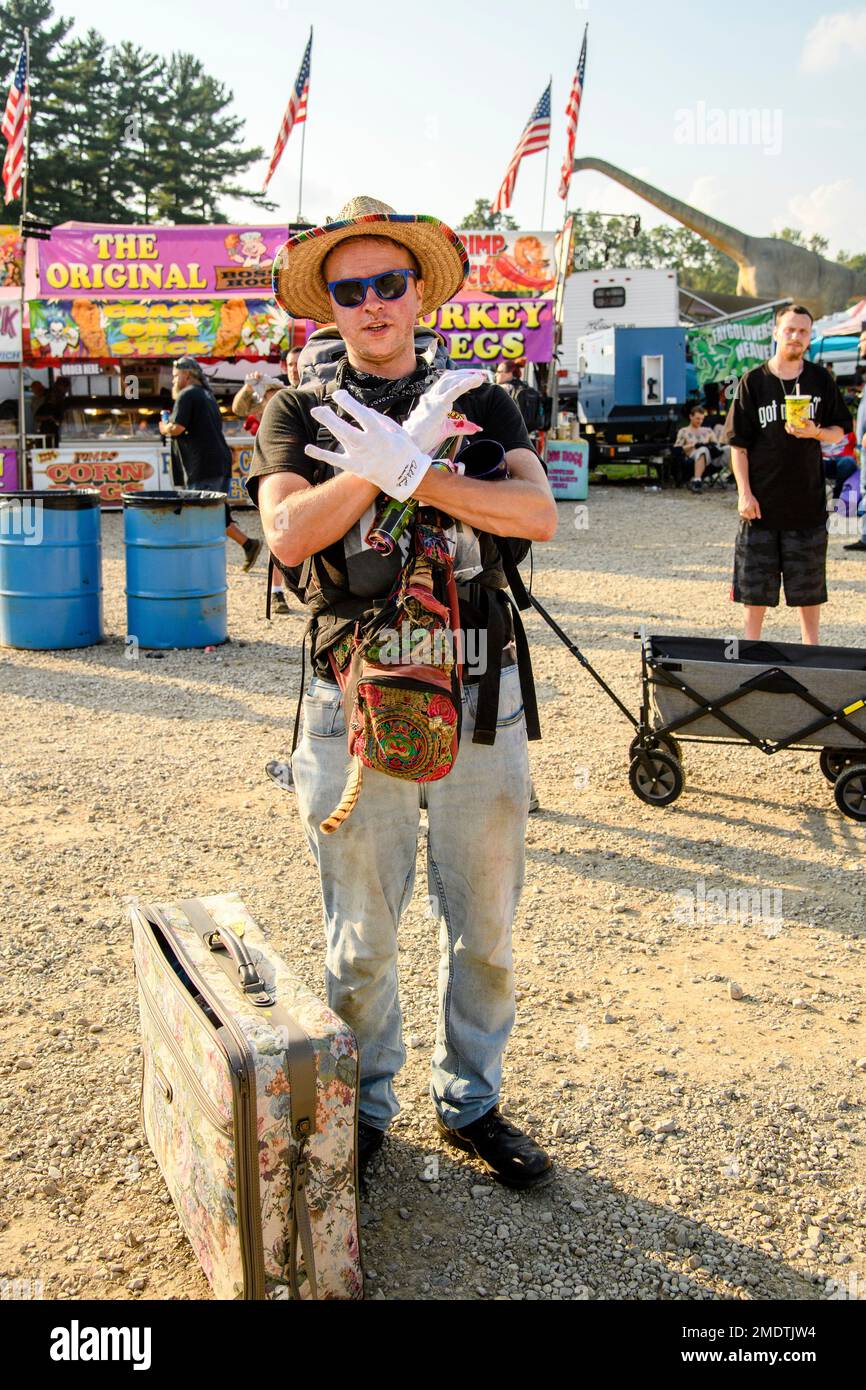 A fan poses for a photo at the 2021 Gathering of the Juggalos on ...