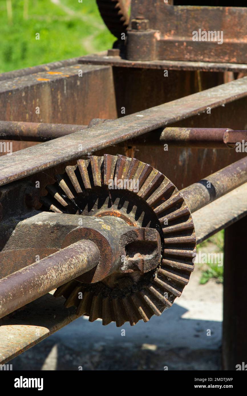 old mechanical metal gears mechanism on the abandoned dam Stock Photo ...