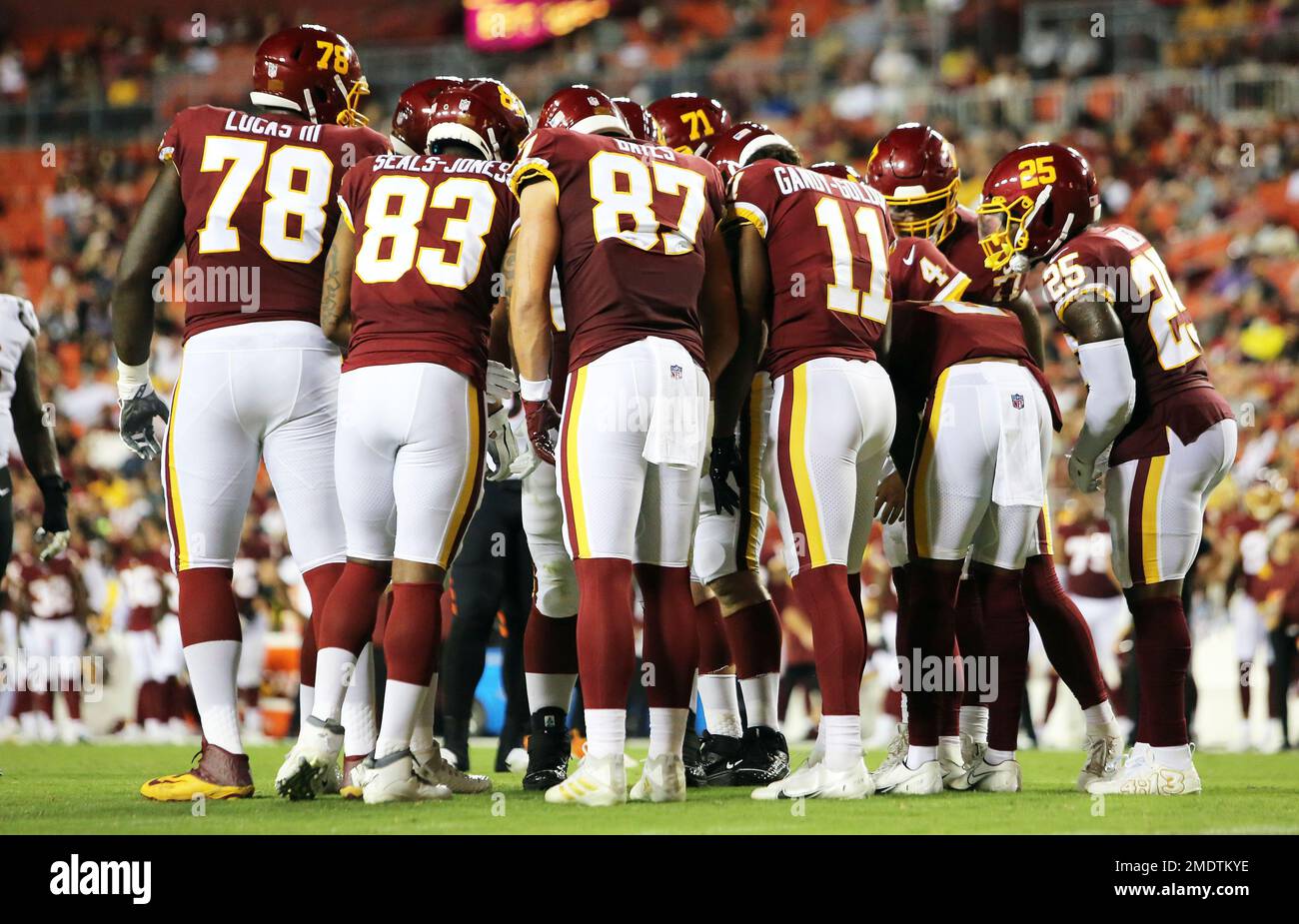 The Washington Football Team huddles up during an NFL preseason ...