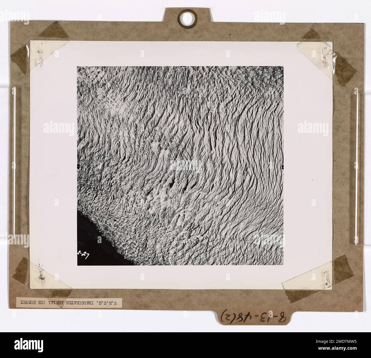 A vertical shot from two miles up captures a detailed ice pattern over ...