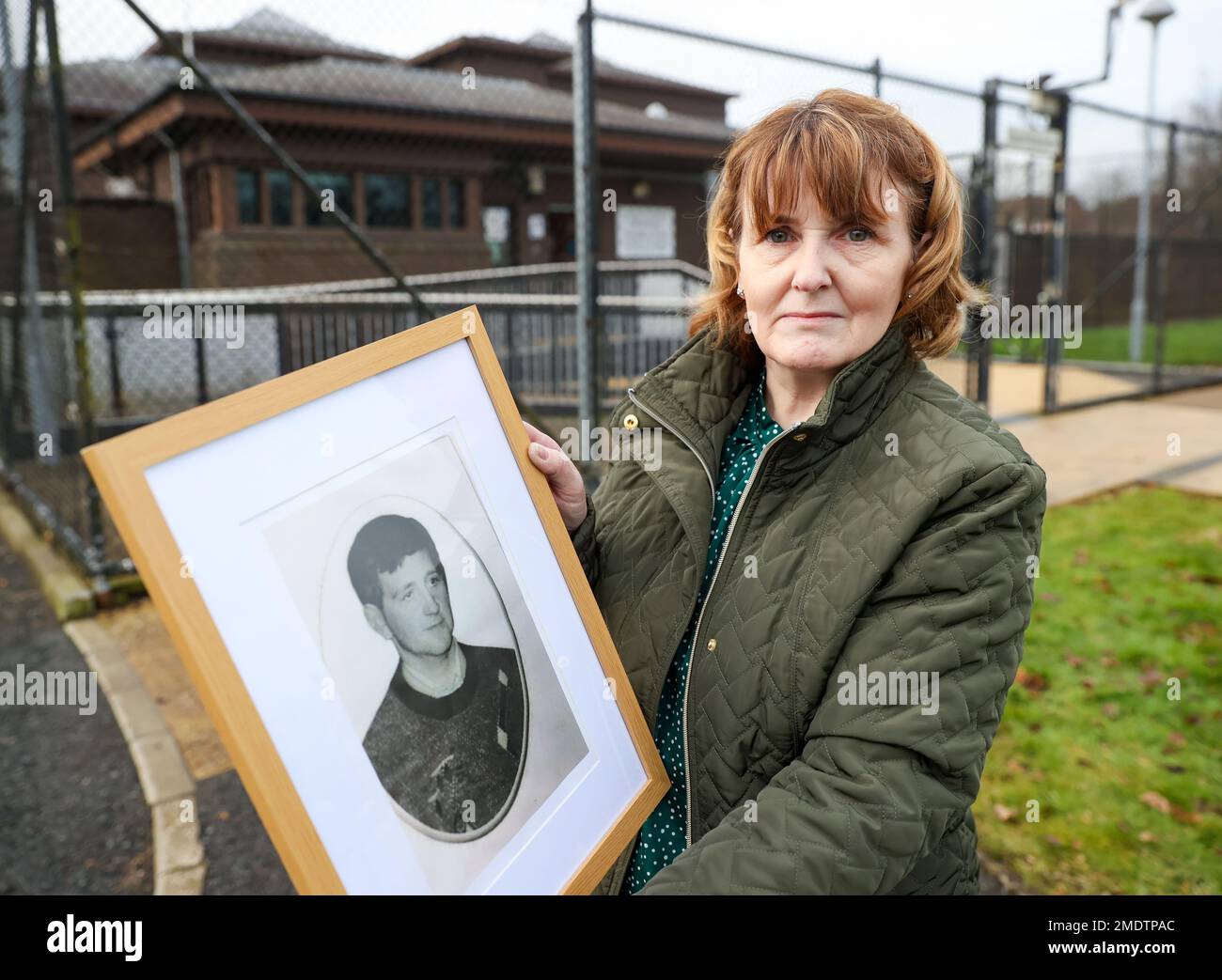 Bernadette McKearney, widow of Kevin McKearney, holding an image of her ...