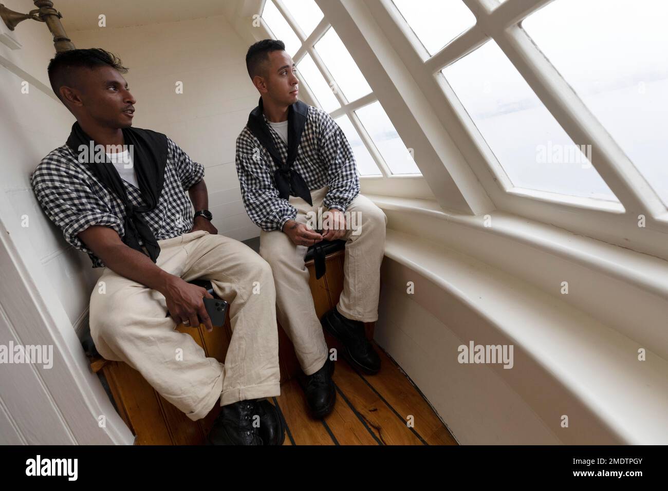 Seaman Ari Modely, left, and seaman Alfonso Ortiz-Lopez sit in an ...