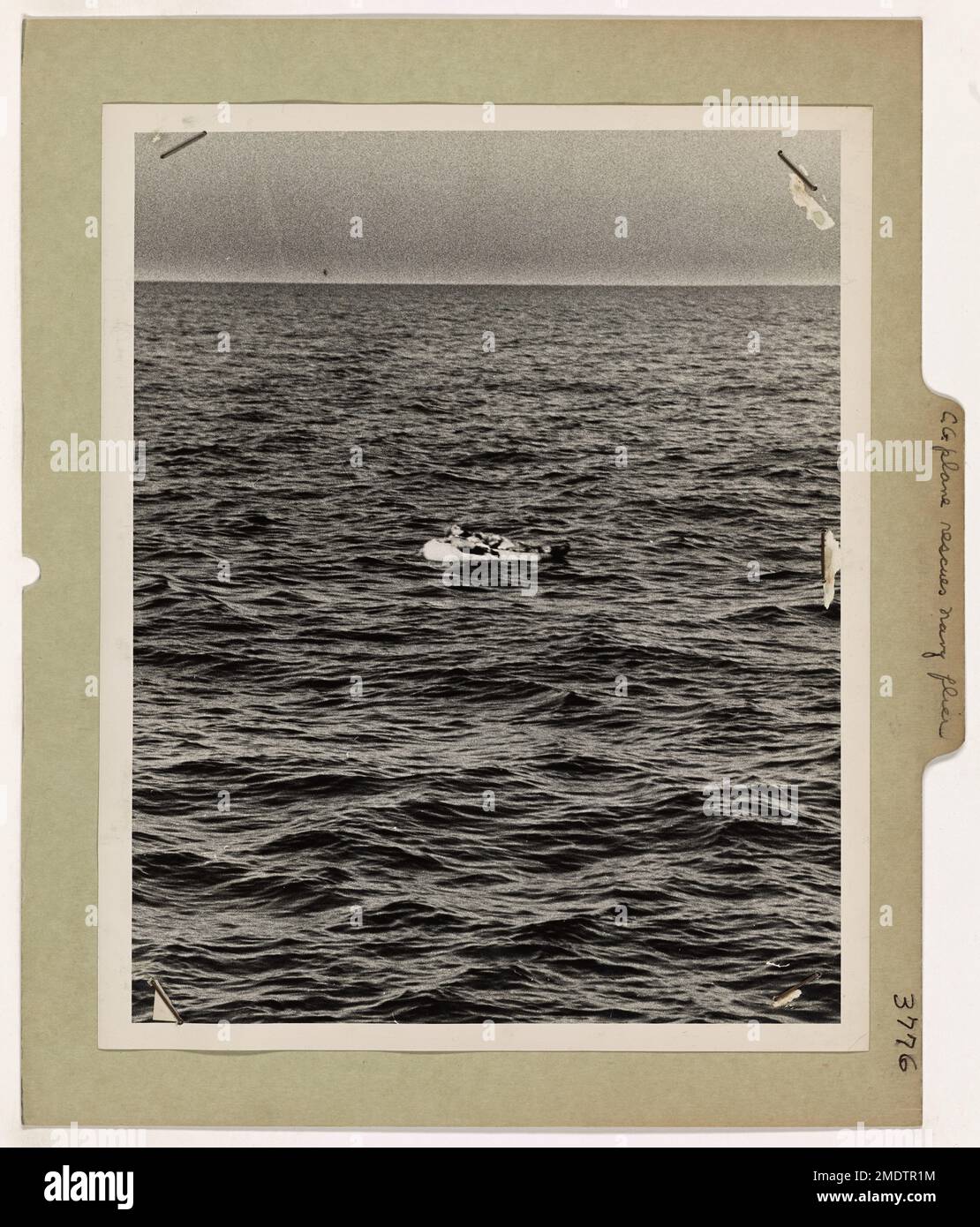 A U.S. Coast Guard plane rescues a Navy pilot stranded in the sea off ...