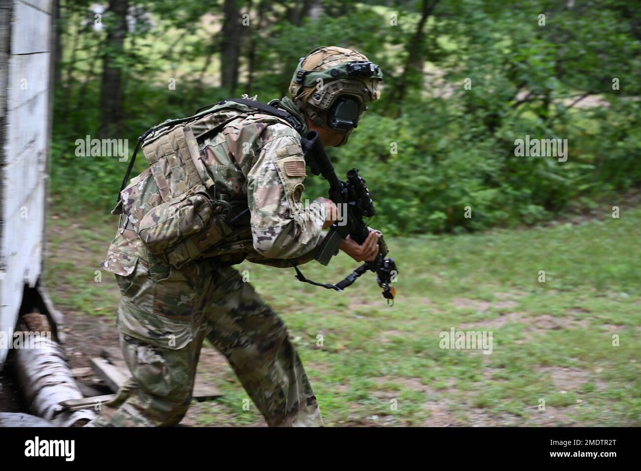 U.S. Air Force member of the 219th Security Forces Squadron runs to ...