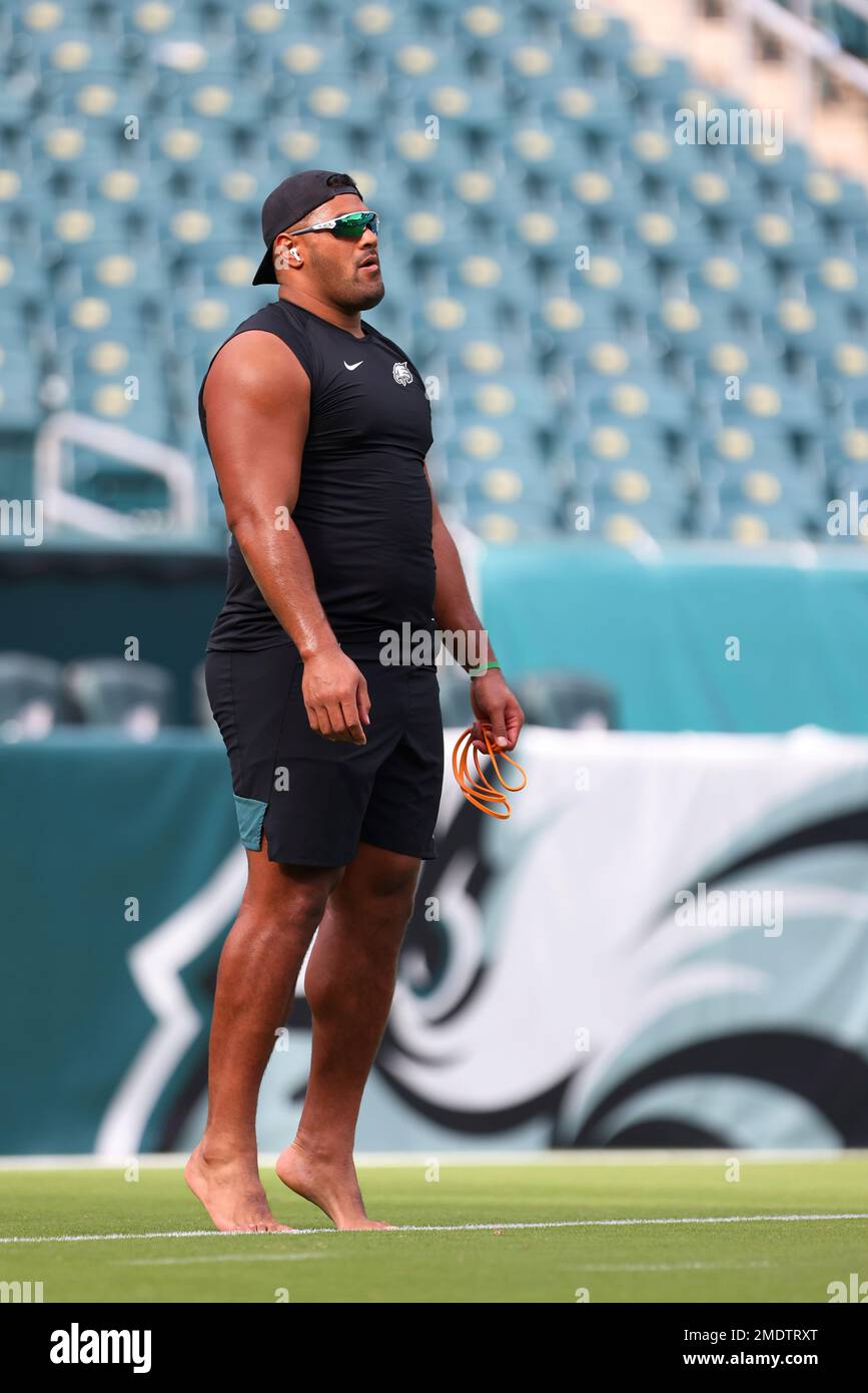 Philadelphia Eagles' Jordan Mailata (68) warms up barefoot before a pre ...