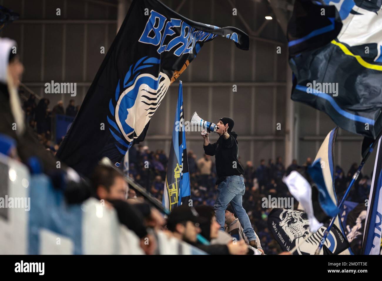 Bergamo, Italy, 15th January 2023. An Atalanta fan uses a megaphone to ...