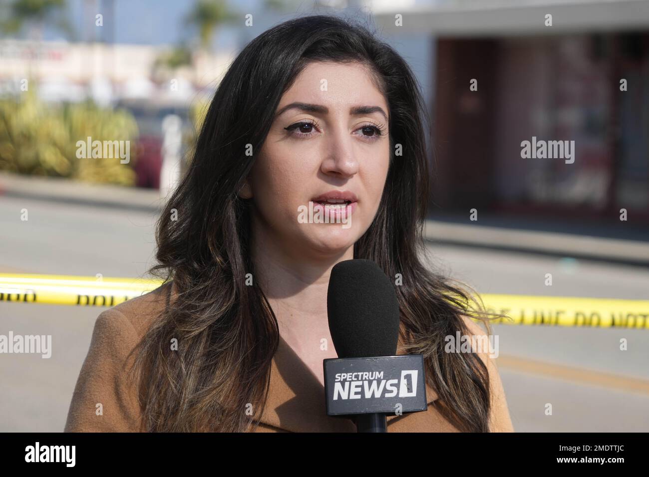 Spectrum News reporter Anna Albaryan near a crime scene at the Star ...