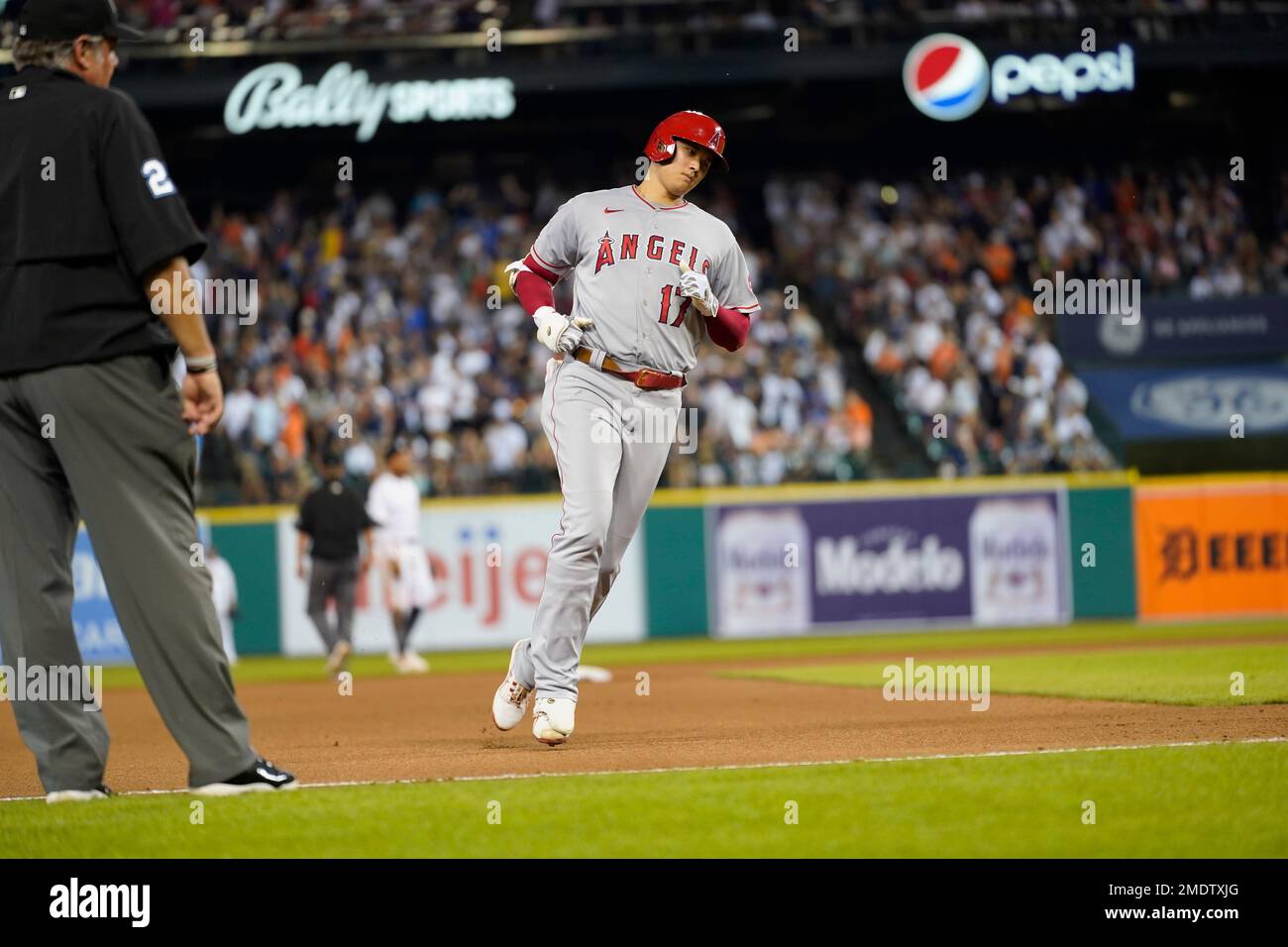 Los Angeles Angels' Shohei Ohtani rounds the bases after hitting his ...