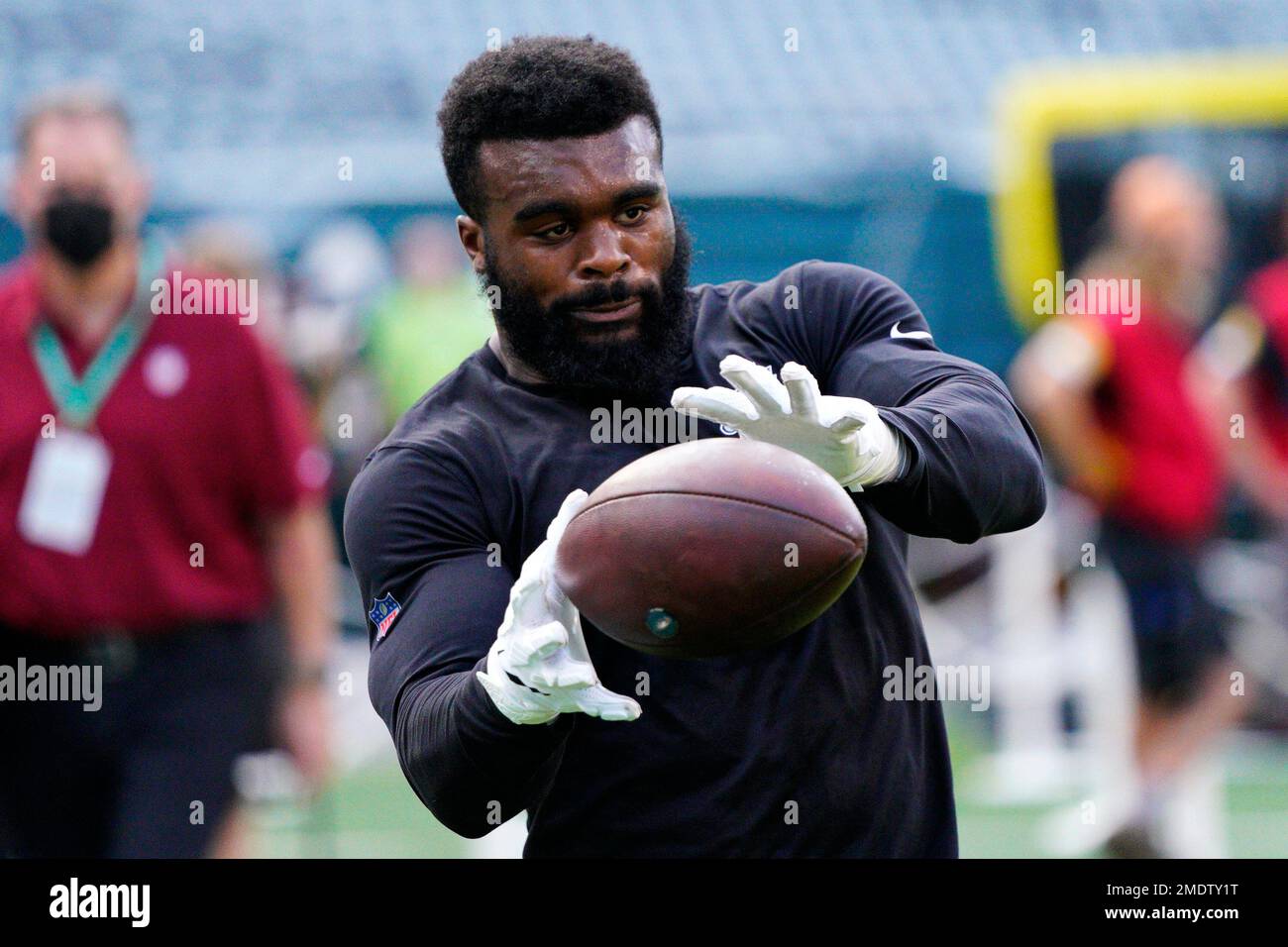 Philadelphia Eagles' Elijah Holyfield warms up before a preseason NFL ...