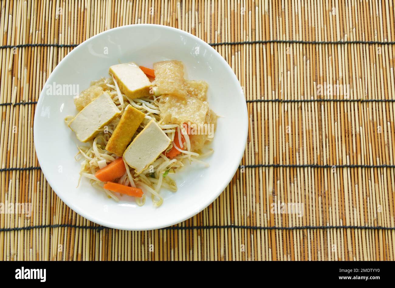 fried bean sprout with slice yellow tofu and pork skin on plate Stock ...