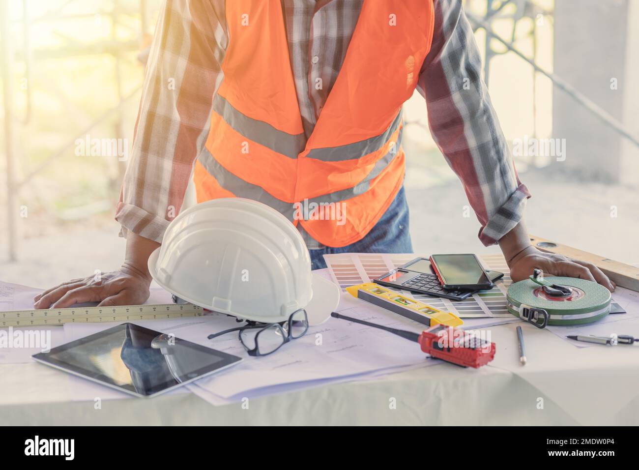 Engineer builder desk working space in construction site with floor ...