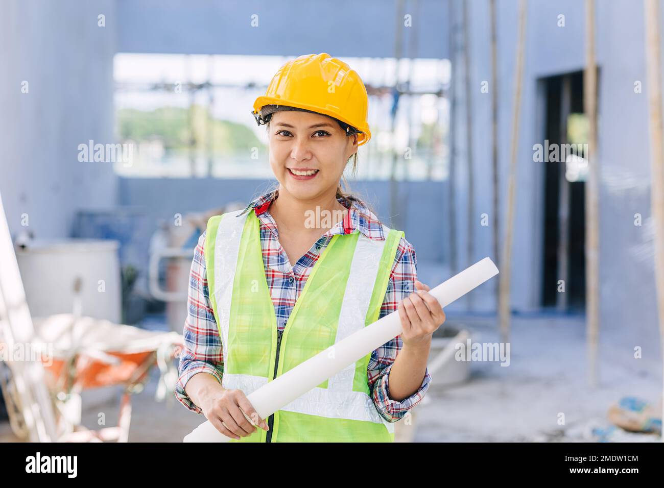 Engineer builder woman worker foreman. Portrait Asian girl architect ... Engineer builder woman worker foreman. Portrait Asian girl architect ...