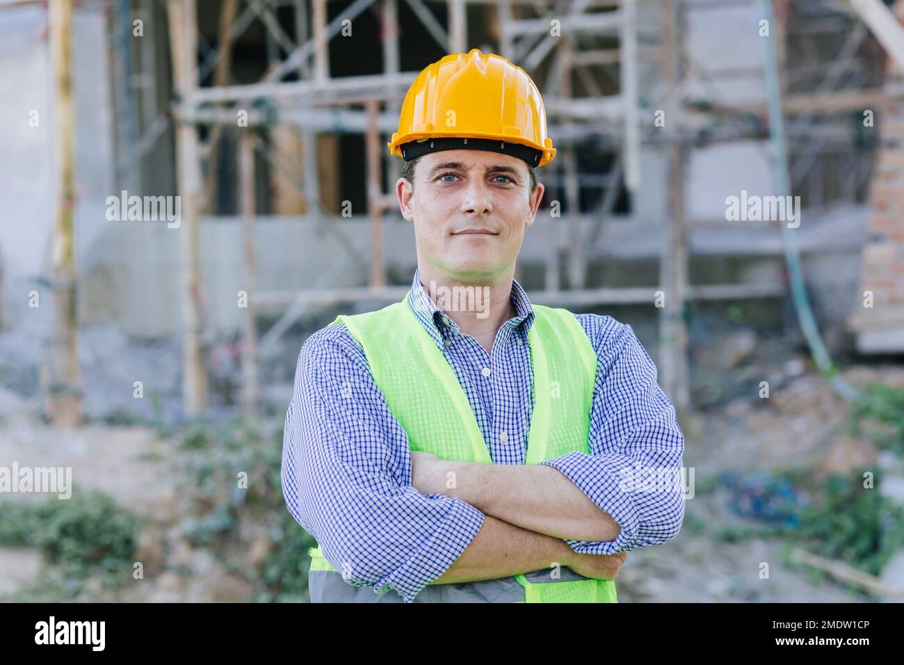 Portrait Engineer builder. Happy Foreman confident arm crossed project ...