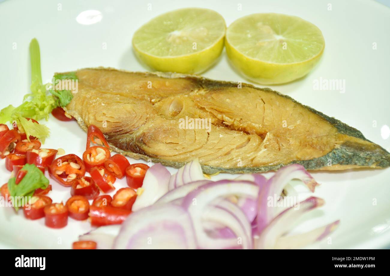 salty dry Indo-Pacific king mackerel fish topping chop shallot and ...