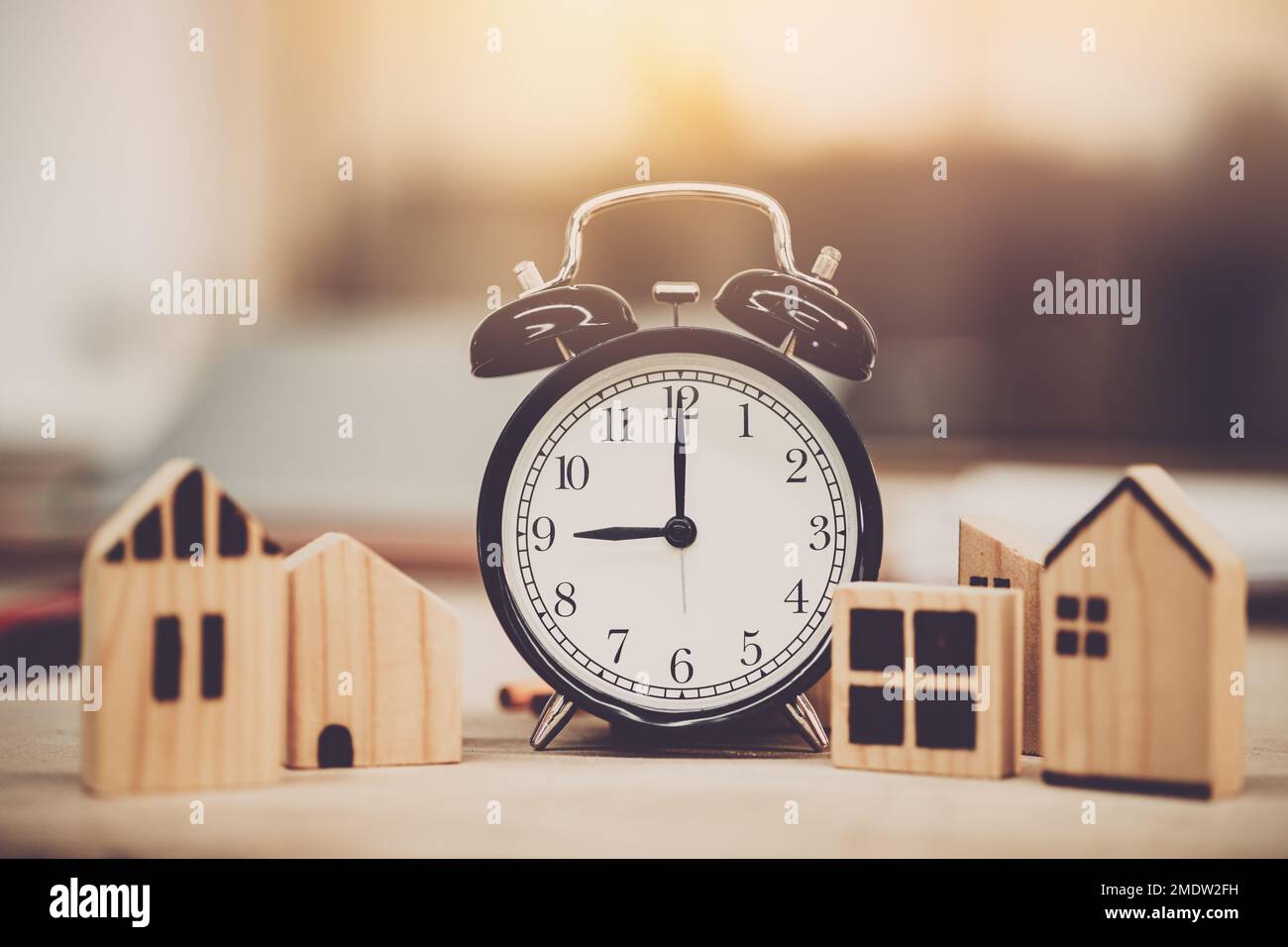 time clock morning day with wooden home toy model decoration house time ...