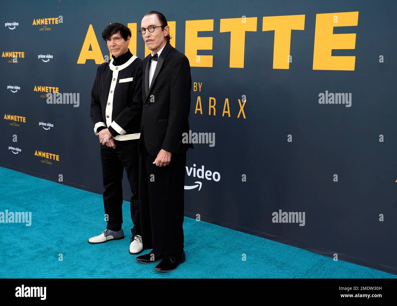 Russell Mael, left, and his brother Ron of the band Sparks pose ...